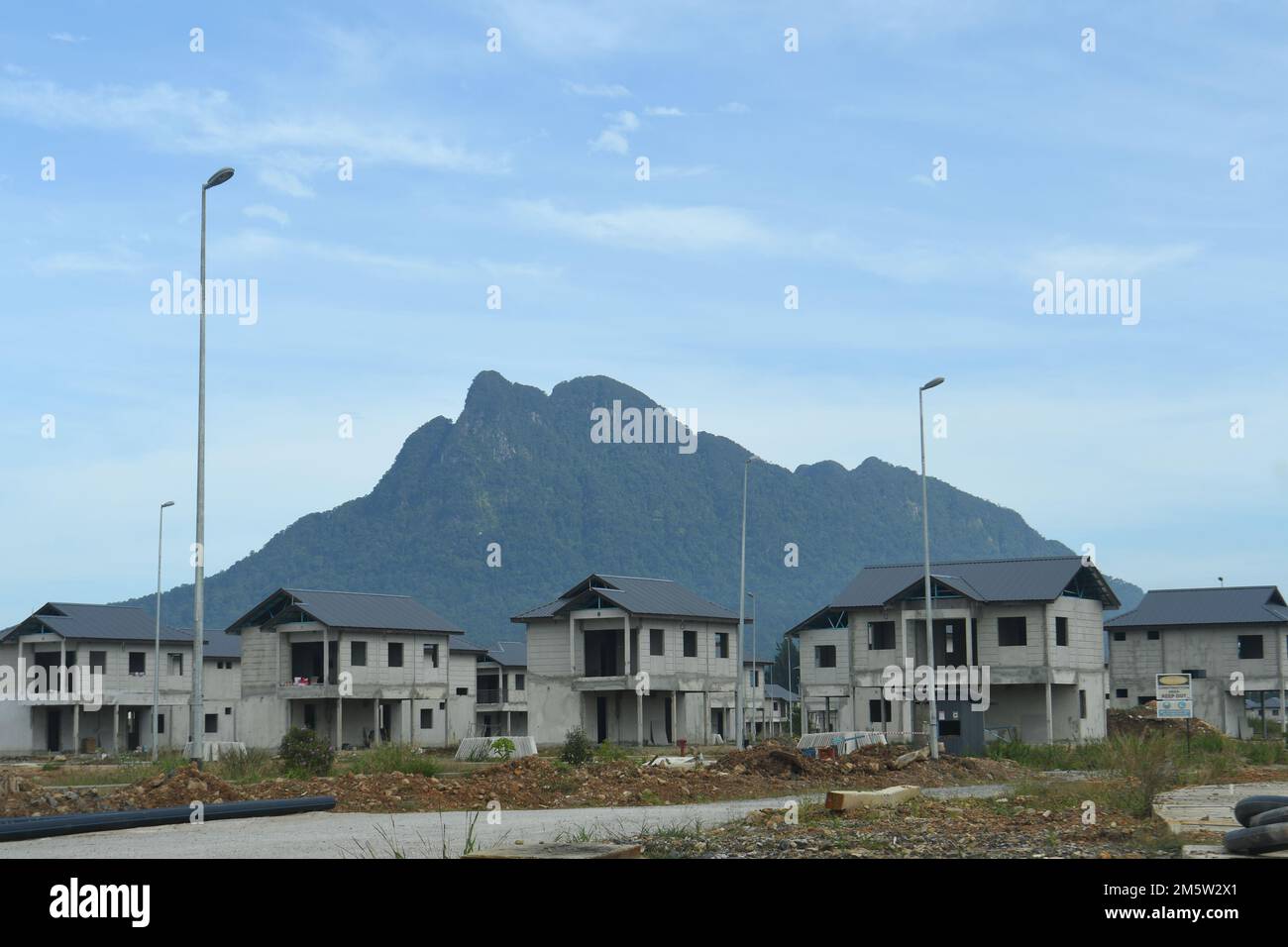 A housing development project with Mountain Santubong as backdrop in ...