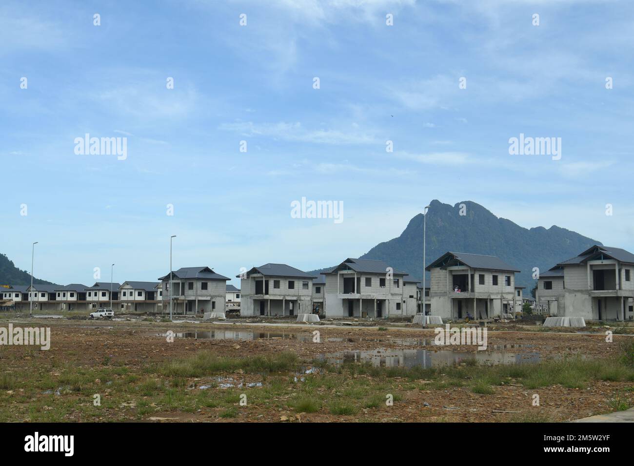 A housing development project with Mountain Santubong as backdrop in ...