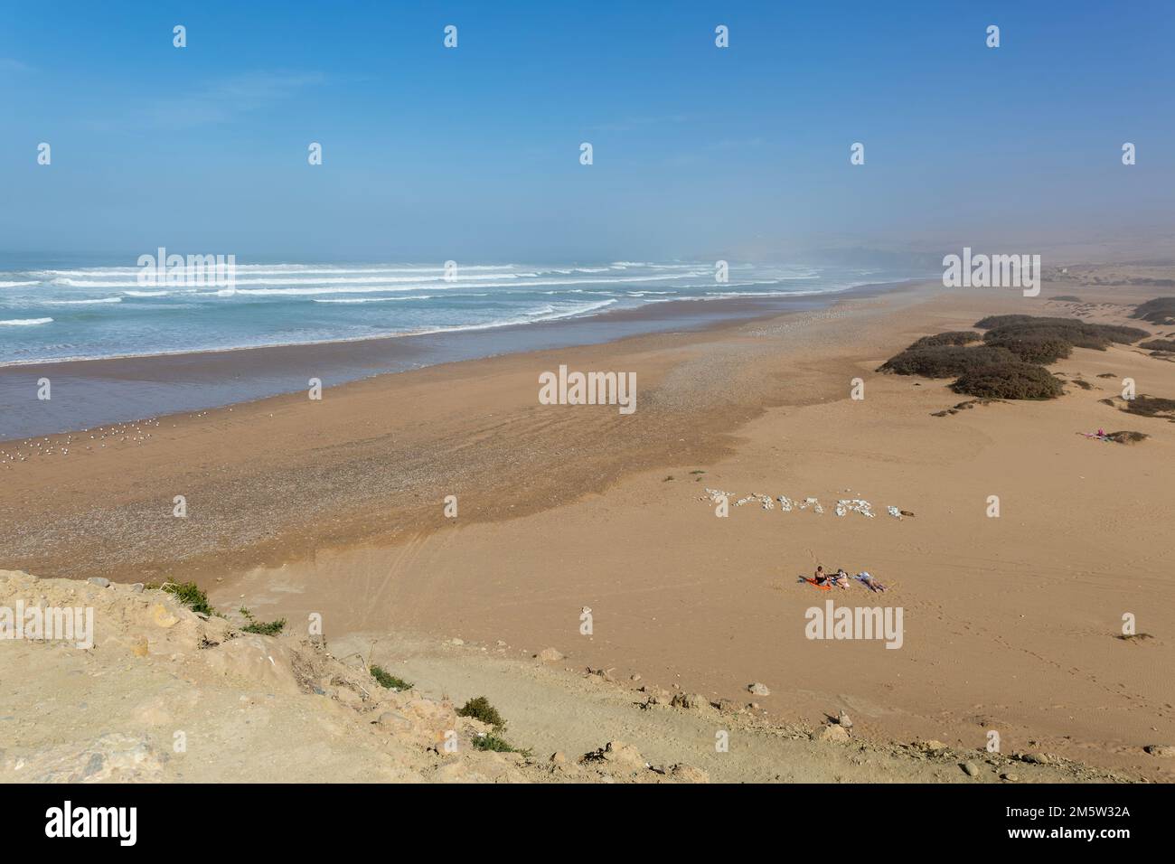 Wide sandy beach Atlantic Ocean waves breaking, Tamri, Morocco, North ...