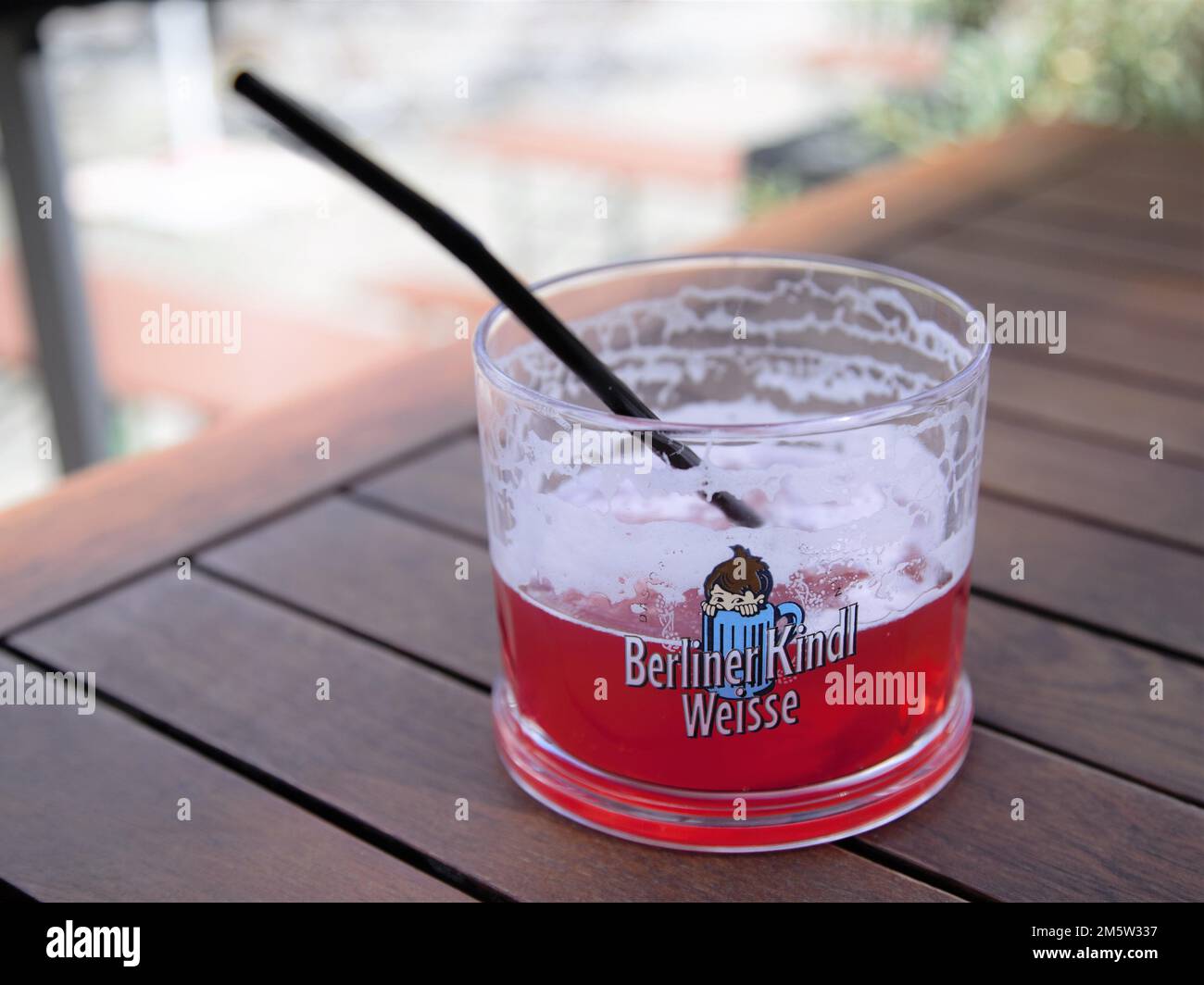 A glass of Berliner Weisse, a typical local drink, in Berlin, Germany ...