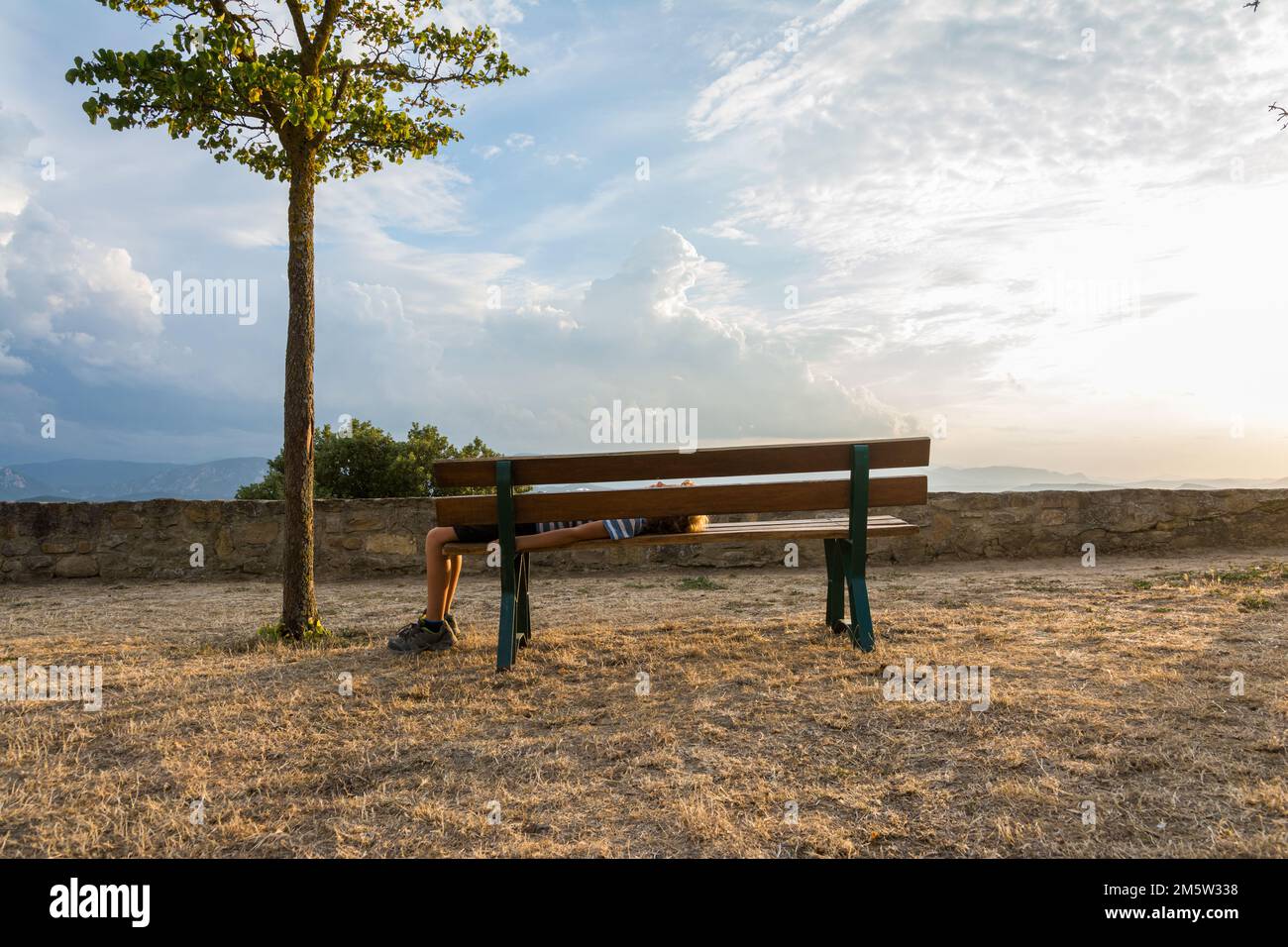 Lying on the bench hi-res stock photography and images - Alamy