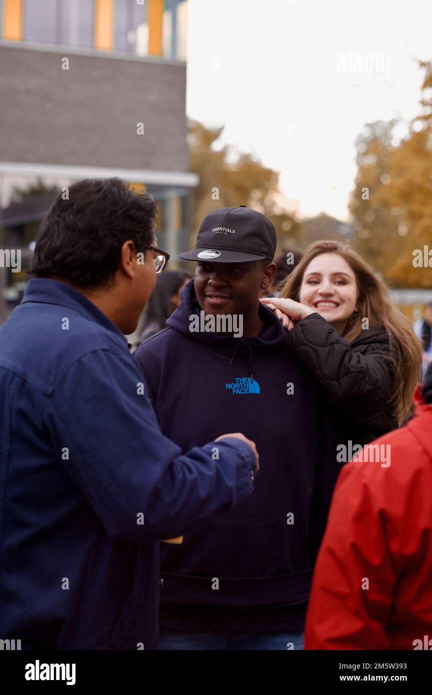 A view of people communicating together Stock Photo - Alamy