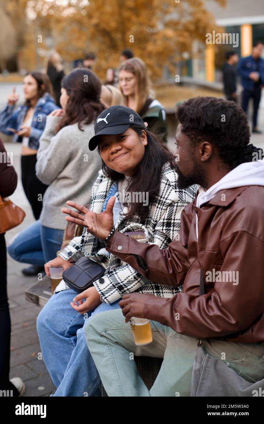 A view of people communicating together Stock Photo - Alamy