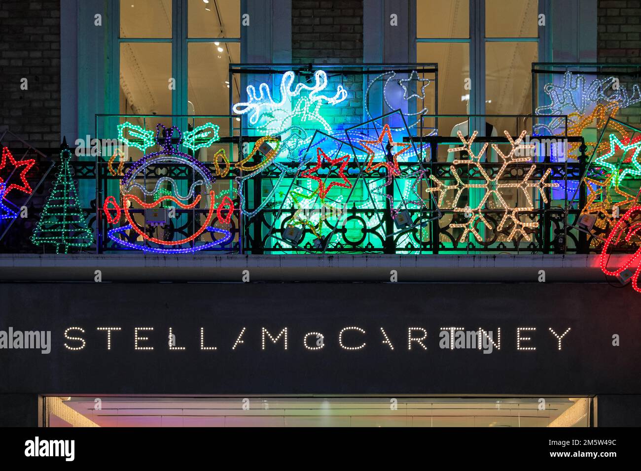 Stella McCartney brand logo and shop front with Christmas decorations ...