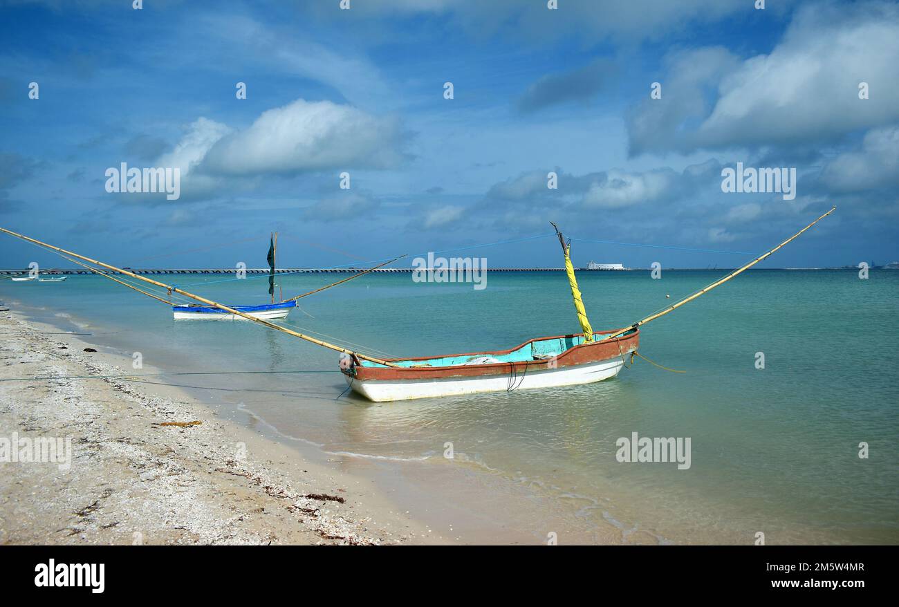 Fishing boat anchored on the coast, beach near the city of Progreso in ...