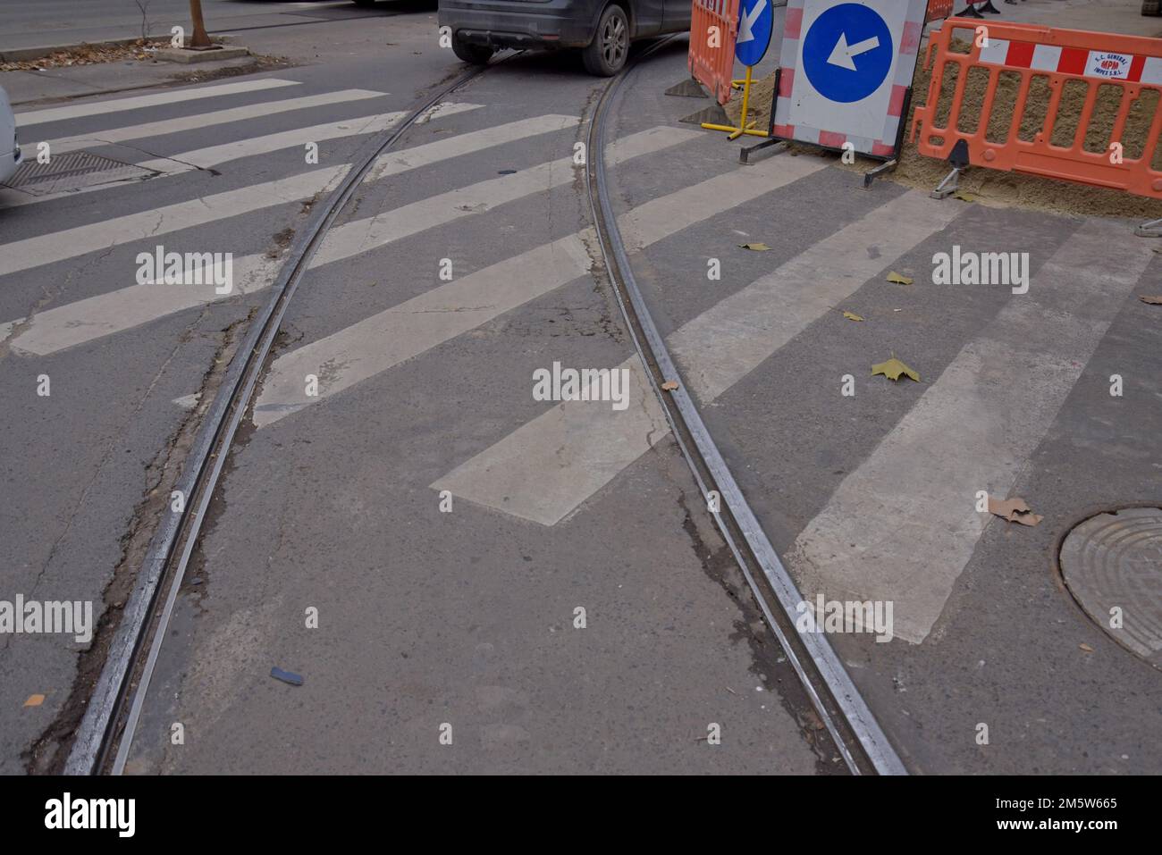 Very worn and damaged tram lines permanent way of the Bucharest tram ...