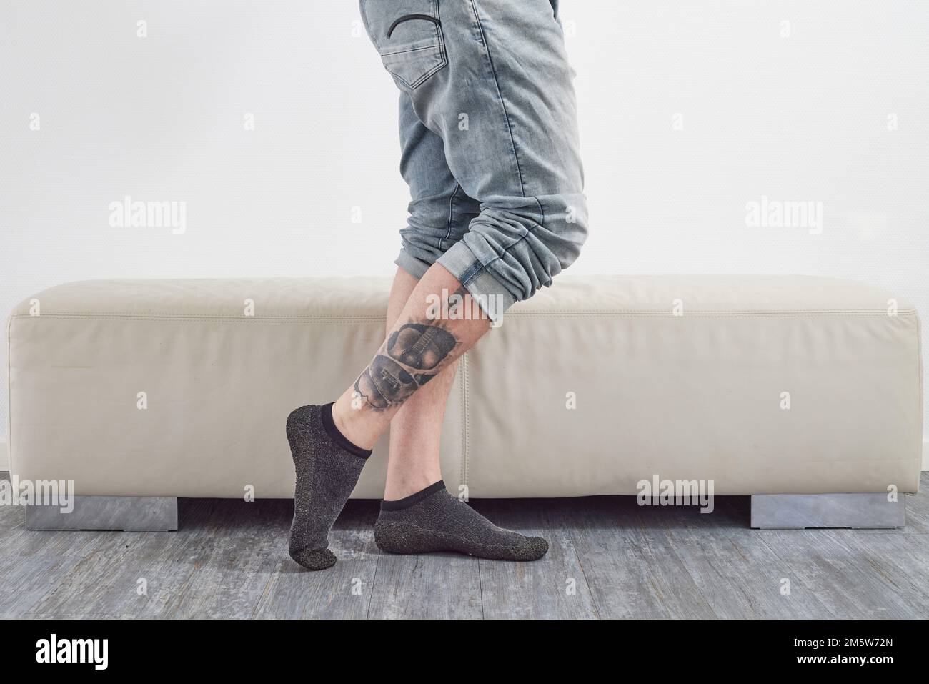 Man with barefoot shoes standing on floor Stock Photo - Alamy