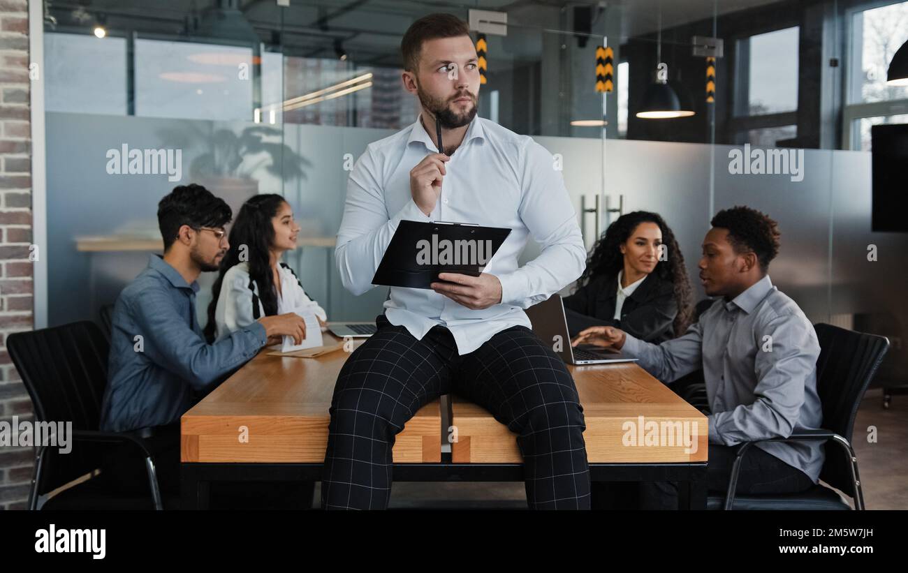 Thoughtful thinking pensive man leader boss businessman company CEO ...