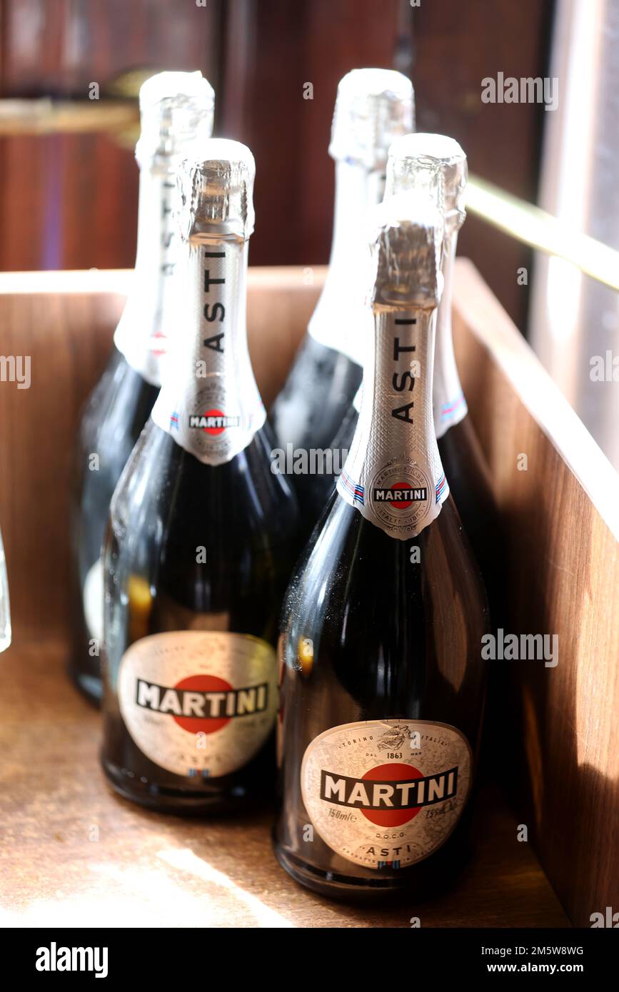 Bottles of Martini on a shelf in a bar in West Sussex, UK Stock Photo ...