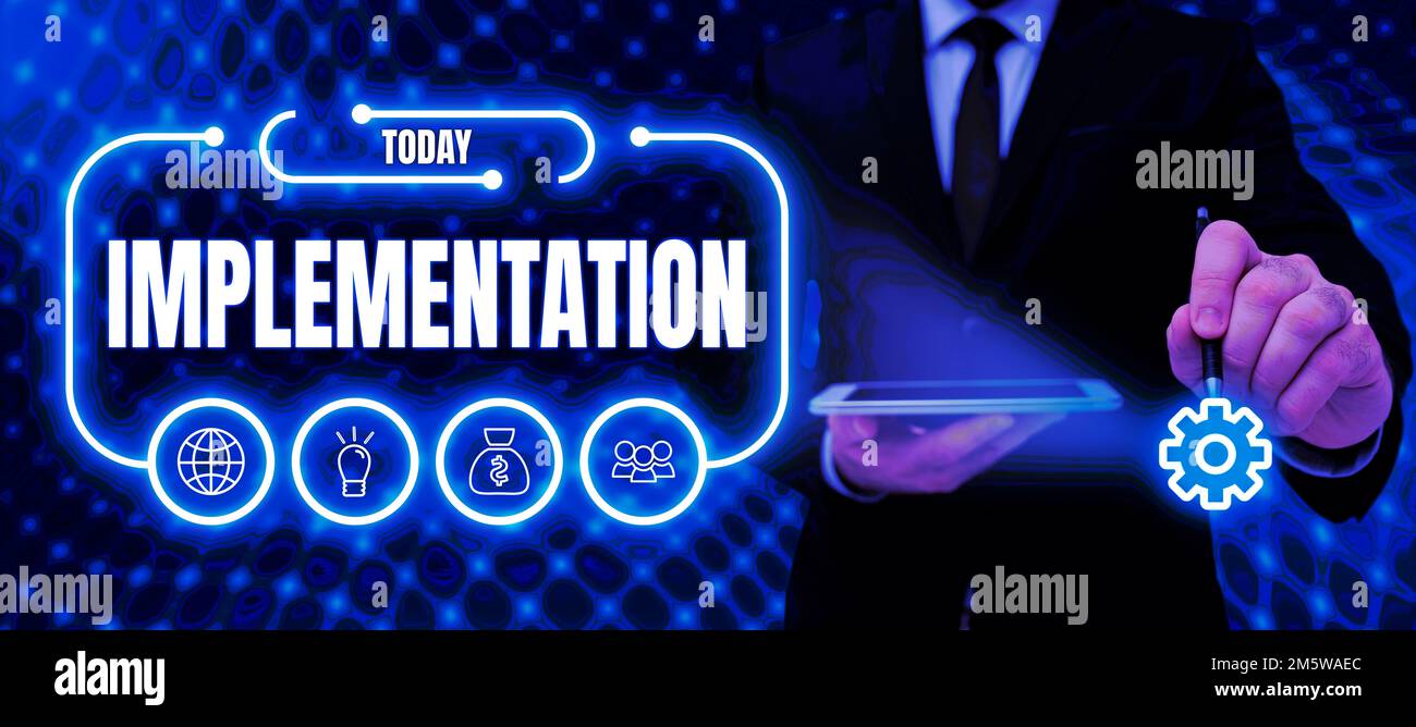 Sign displaying Implementation. Business showcase The process of making ...