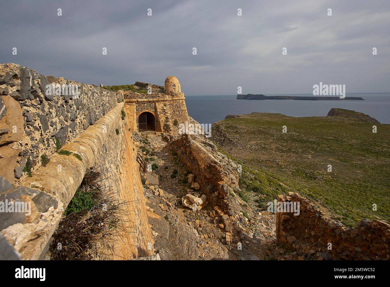 Venetian Sea Fortress Gramvoussa, morning light, cloudy sky, fortress wall, fortress gate, round ...
