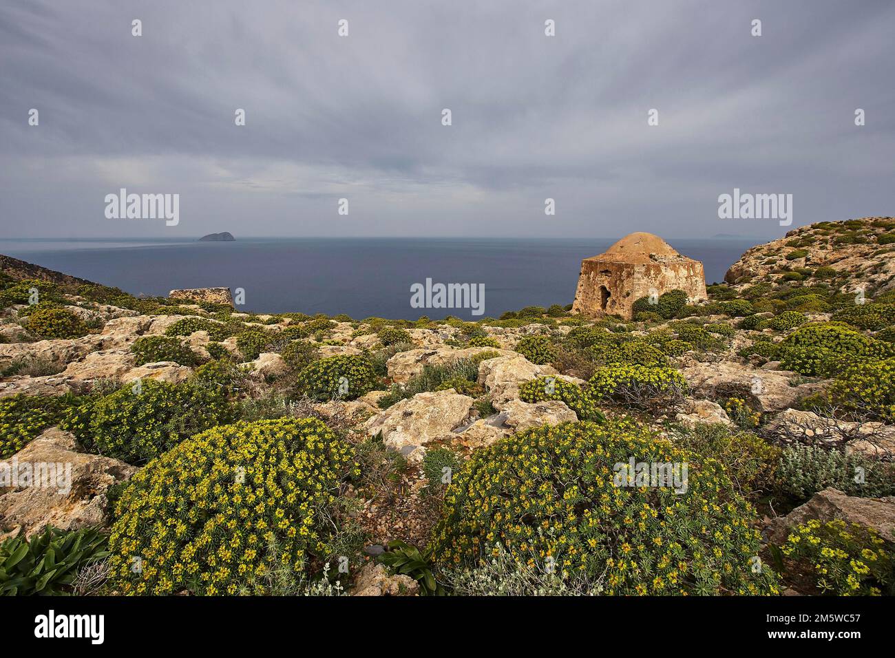 Morning light, grey dramatic cloudy sky, square defence defence tower ...