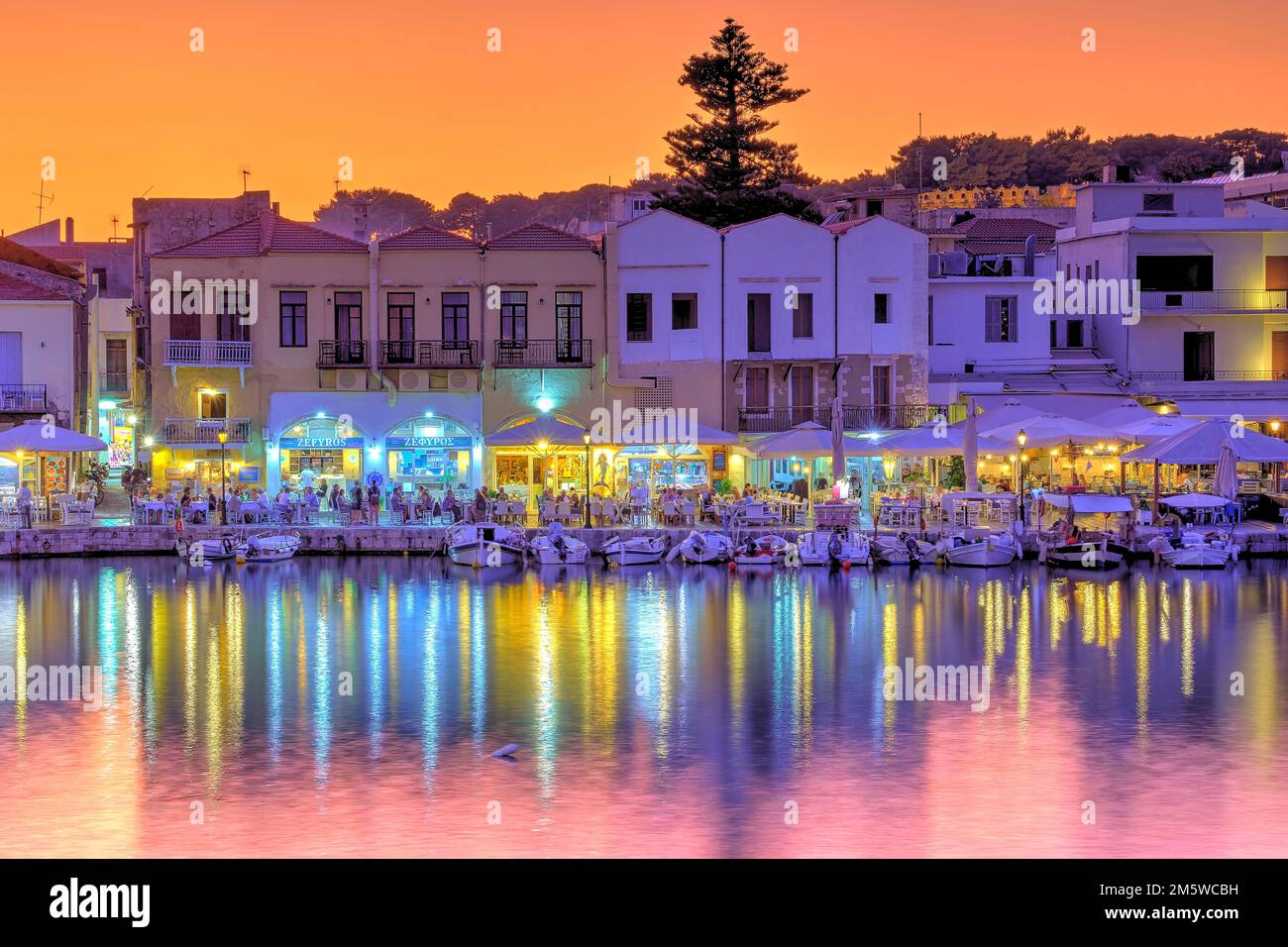 Venetian harbour, dusk, night shots, orange sky, colourful rows of ...