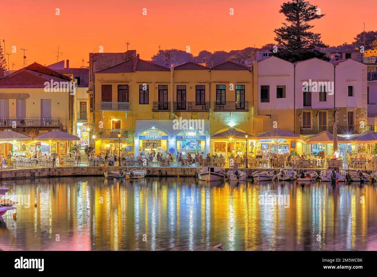Venetian harbour, dusk, night shots, orange sky, colourful rows of ...