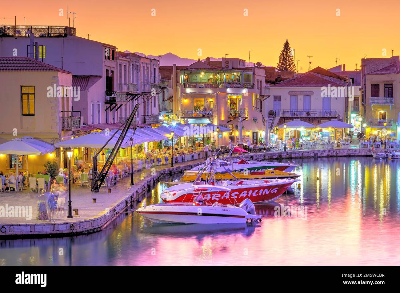 Venetian harbour, dusk, night shots, orange sky, colourful rows of ...