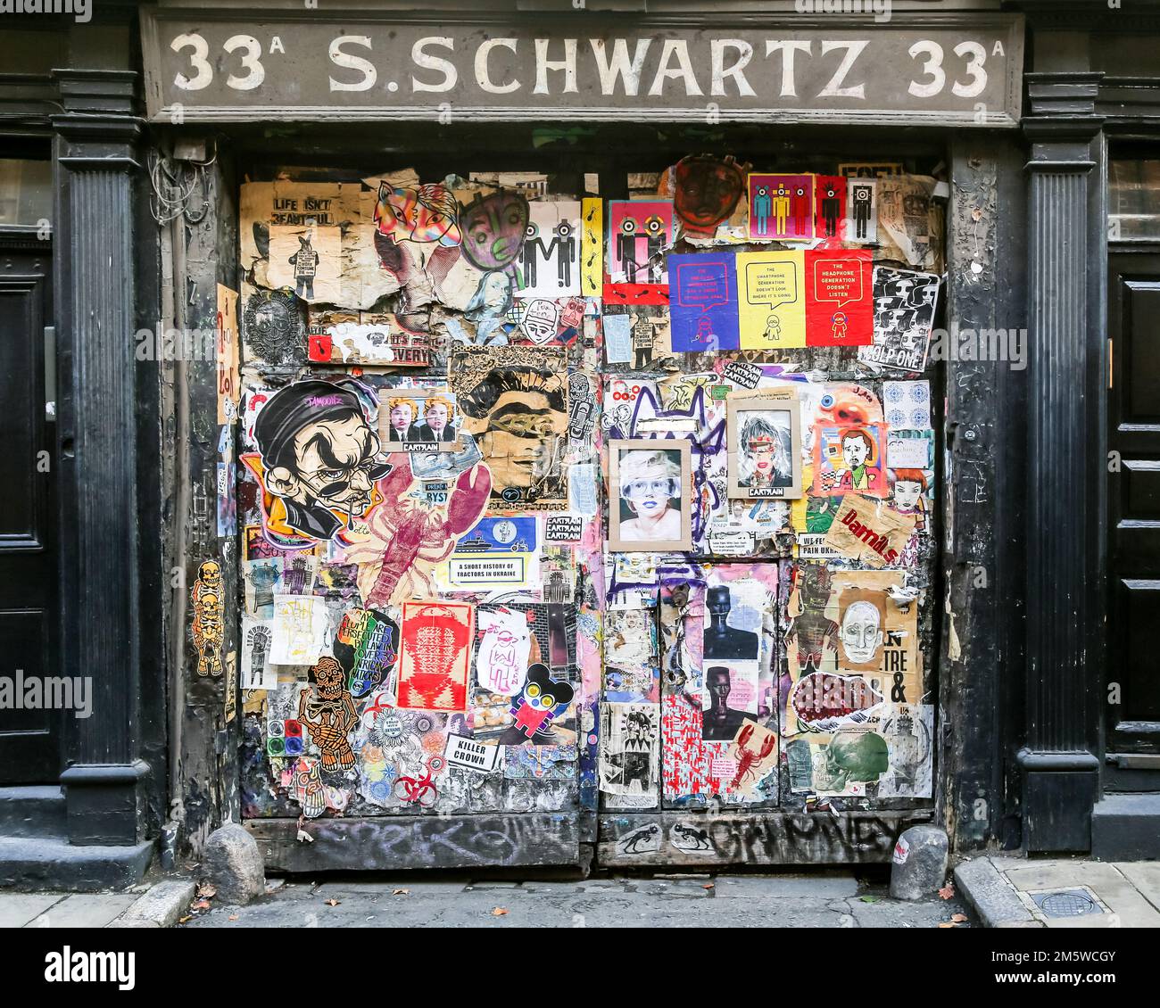 Colourful collection of street art in Fournier Street in London's ...