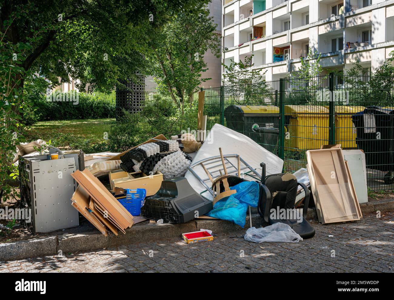 Domestic waste stored on public road land, Potsdam, Brandenburg ...