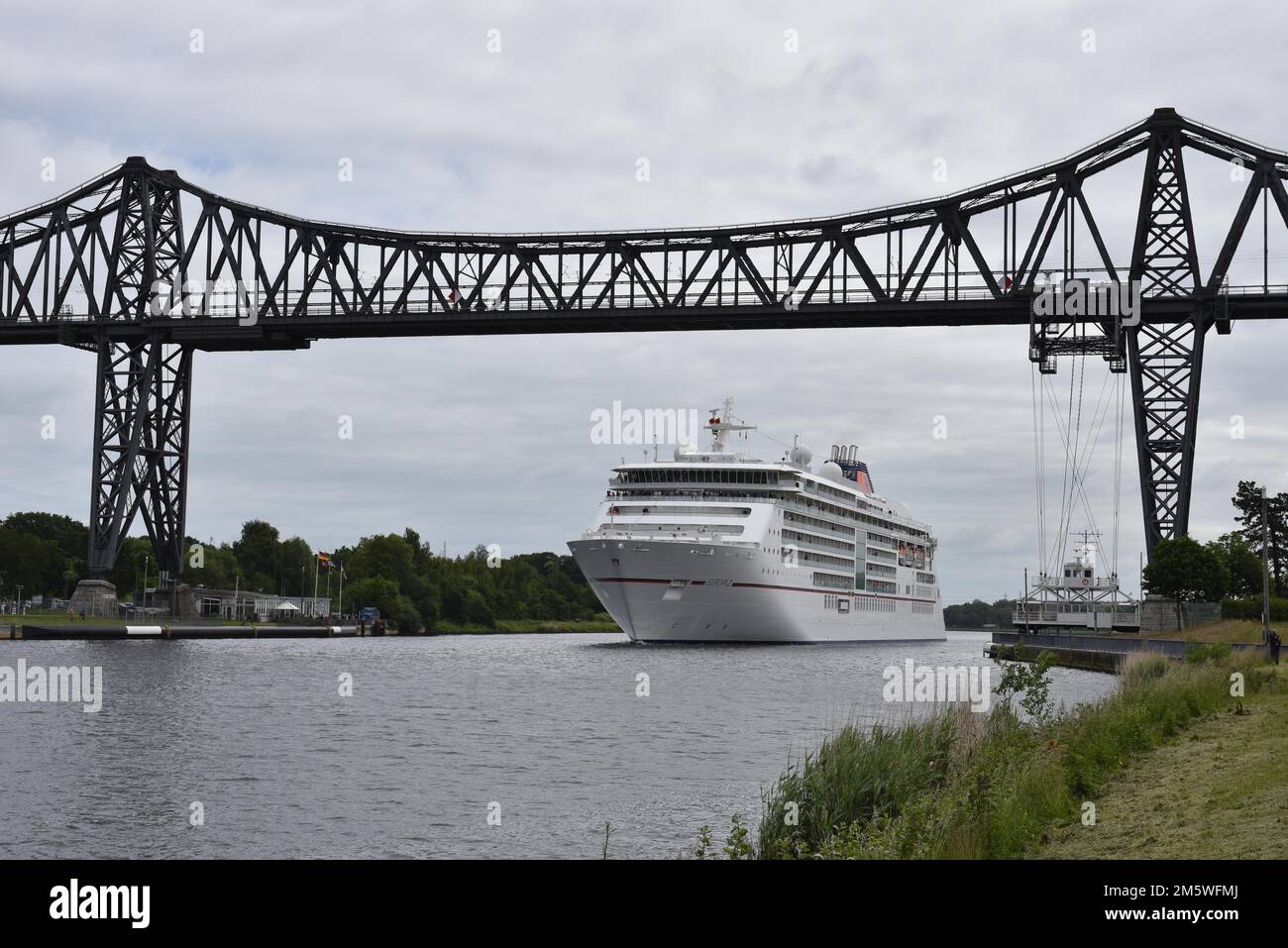 Cruise ship Europa 2 under the Rendsburg High Bridge in the Kiel Canal, Germany Stock Photo - Alamy