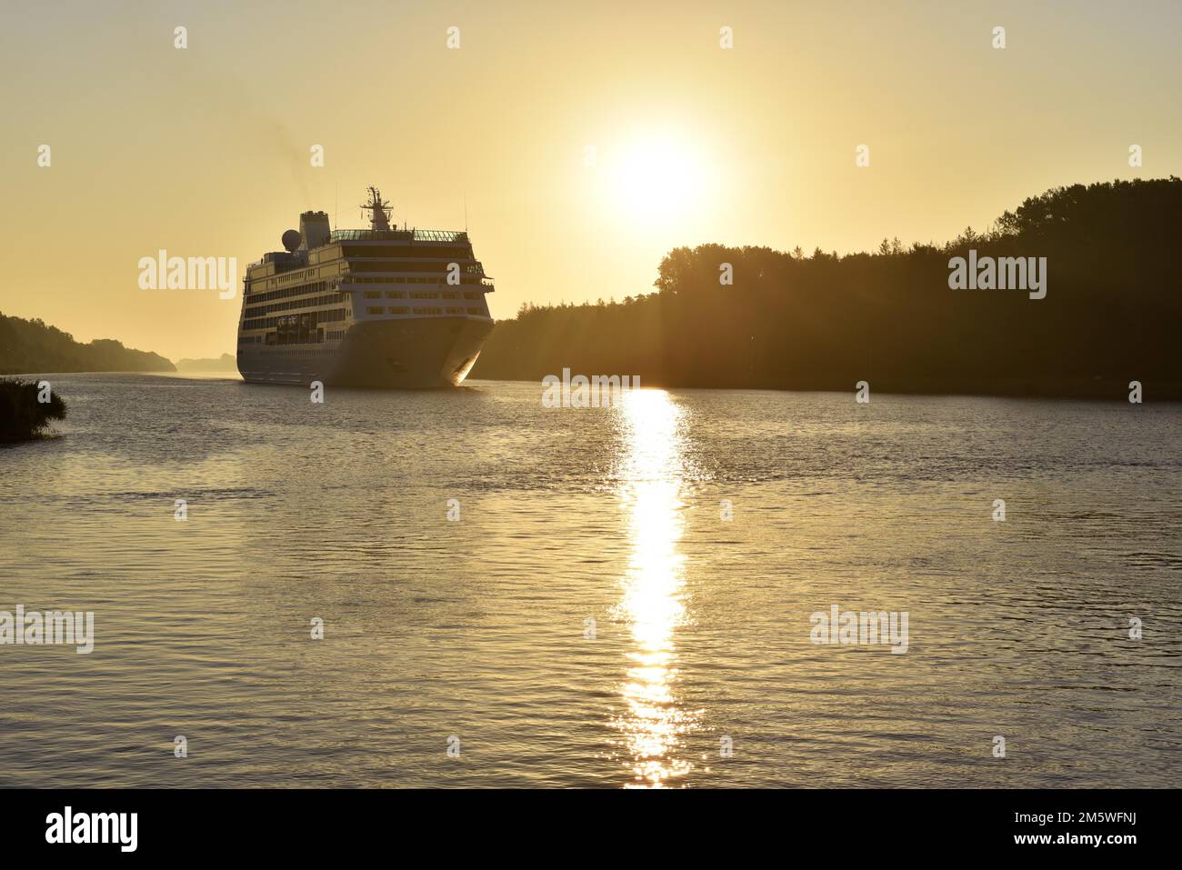 Cruise ship Insignia at sunrise in the Kiel Canal, Germany Stock Photo ...