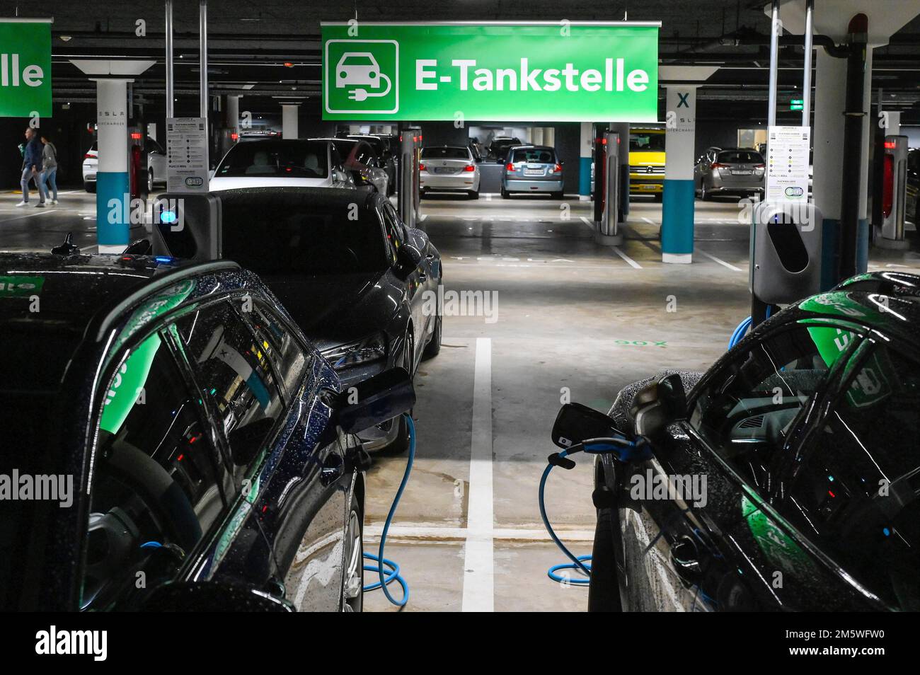 Parking garage E-filling station Electric cars Stock Photo - Alamy