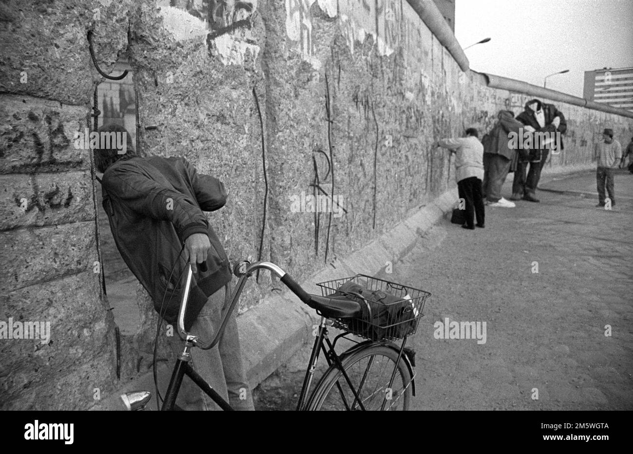 GDR, Berlin, 22. 02. 1990. Wall at Potsdamer Platz, cardboard figures ...