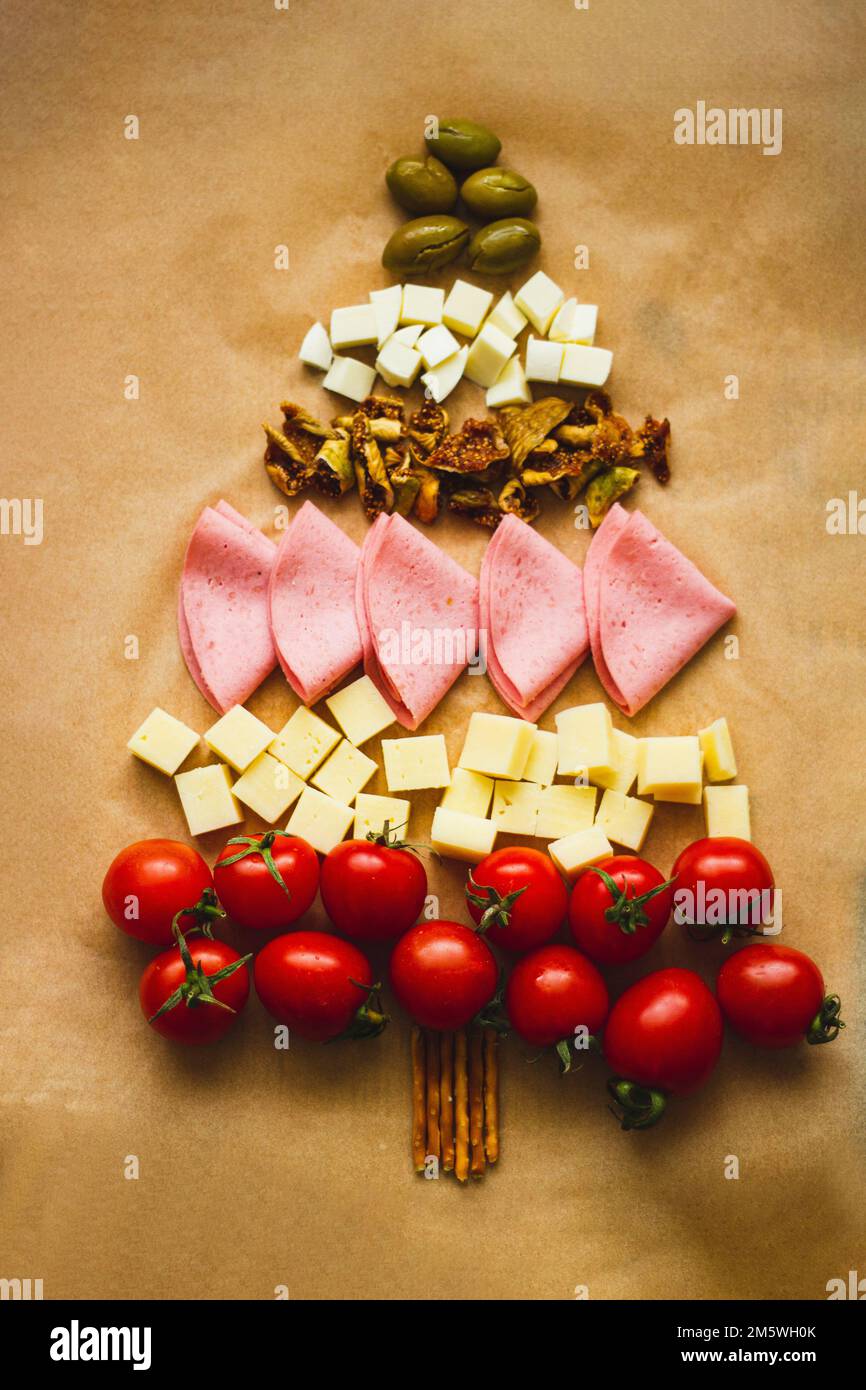 yummy christmas food tree on beige background Stock Photo - Alamy