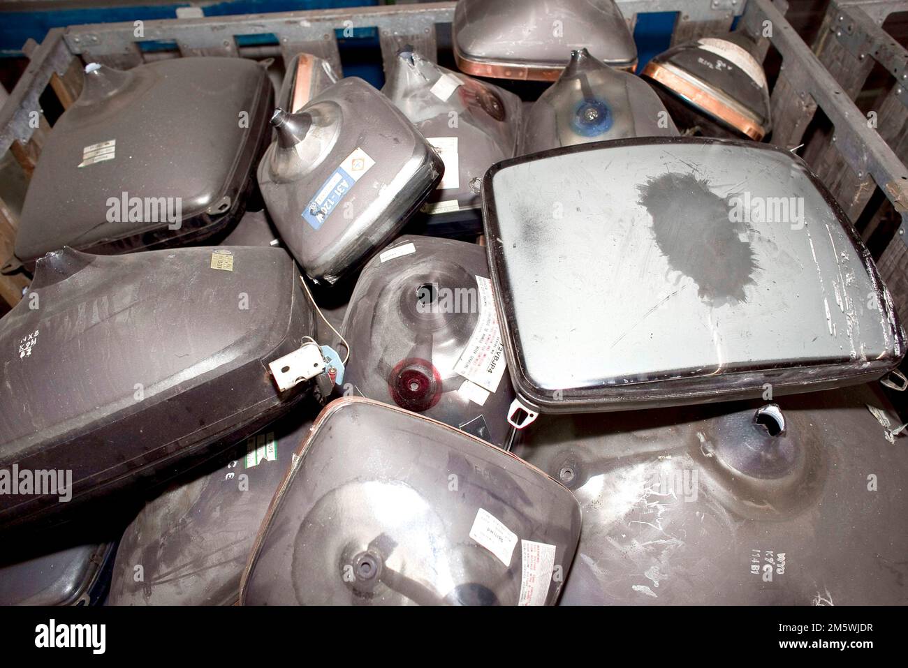 E-waste. Electronics recycling by sims, dismantling televisions ...