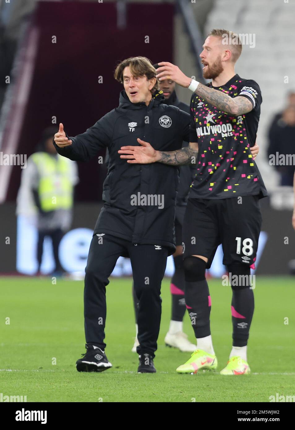 London ENGLAND - December 30 L-R Thomas Frank manager of Brentford and Pontus Jansson of ...