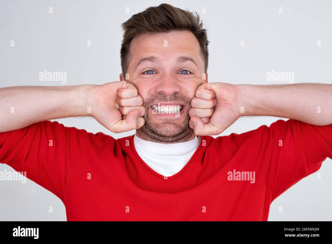 Bully throwing a punch towards the camera with fists clenched Stock ...