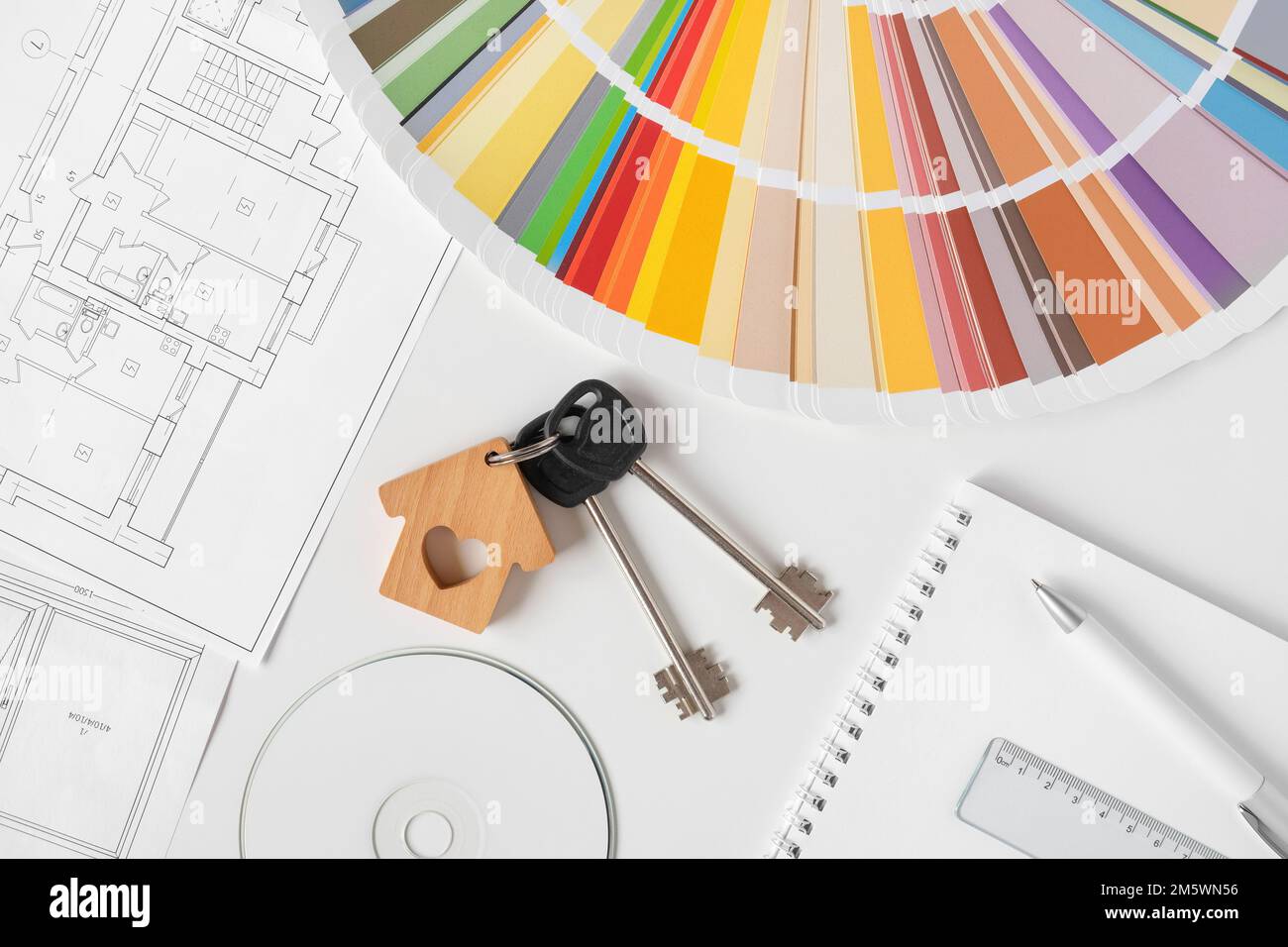 Hands choosing Colors of Interior Design from the Color Guide ...