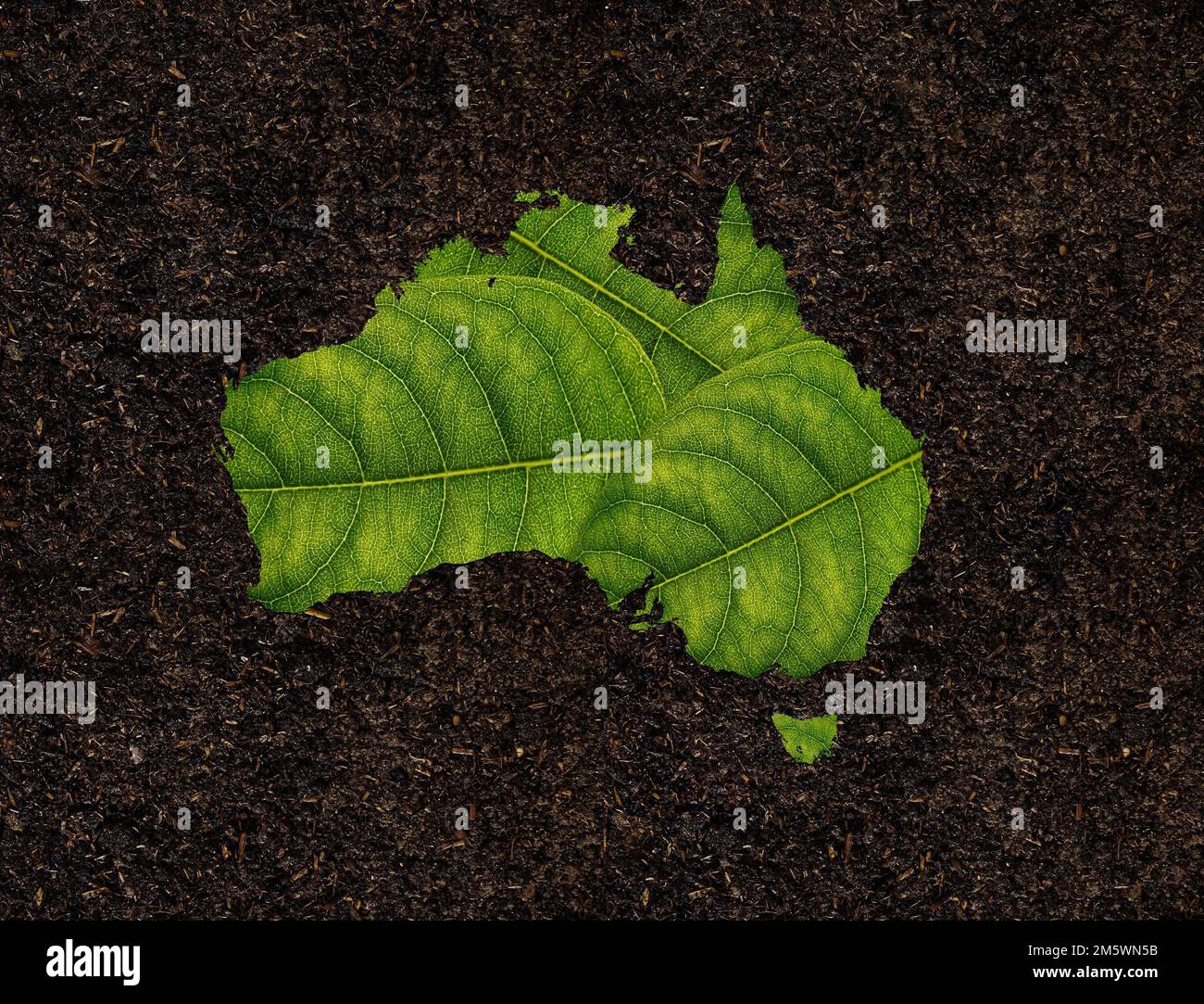 An illustration of an Australian map, made of a green leaf on soil, the ...