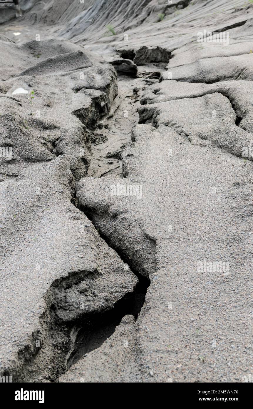 Heap Of Gravel With Water Stains From Rain On A Background Of Blue Sky heap-of-gravel-with-water-stains-from-rain-on-a-background-of-blue-sky