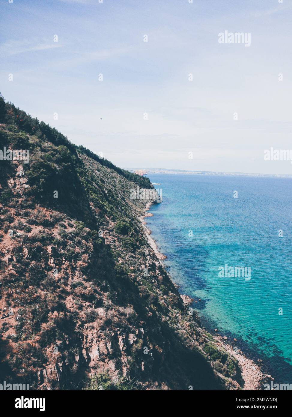 mountain slope forest hill summit sea water view Stock Photo - Alamy