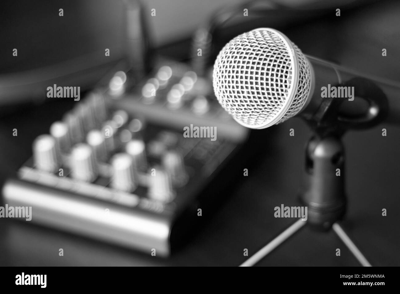 Microphone and mixer on the table. Recording studio, radio podcast ...