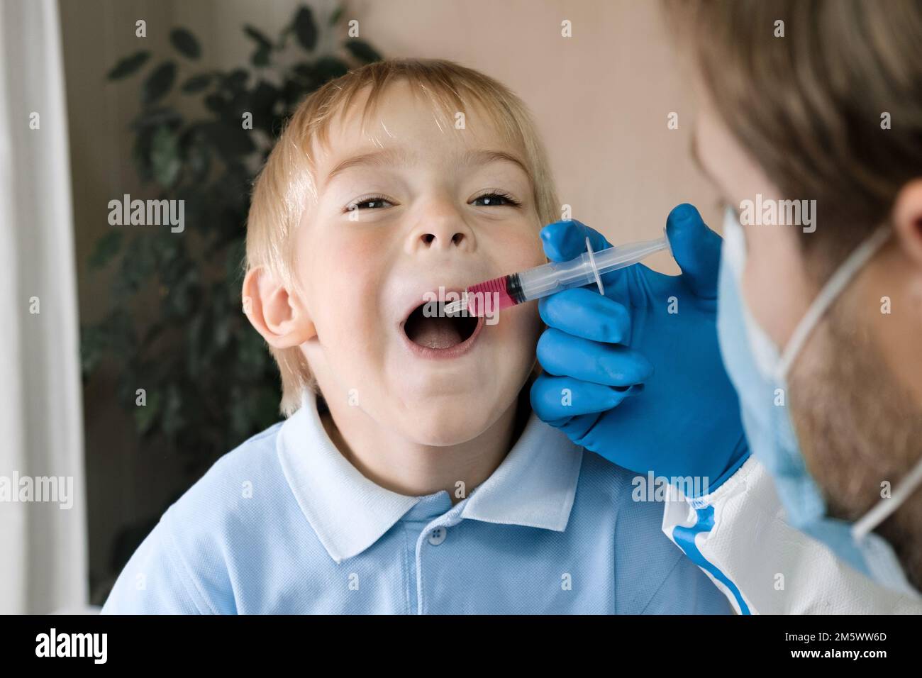 Kid getting polio drops. Doctor making to Child Oral Vaccination ...
