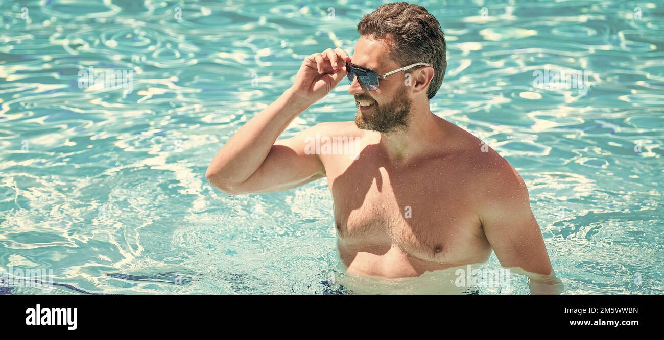 Summertime vacation. Guy wear glasses in water. Free time and day off ...