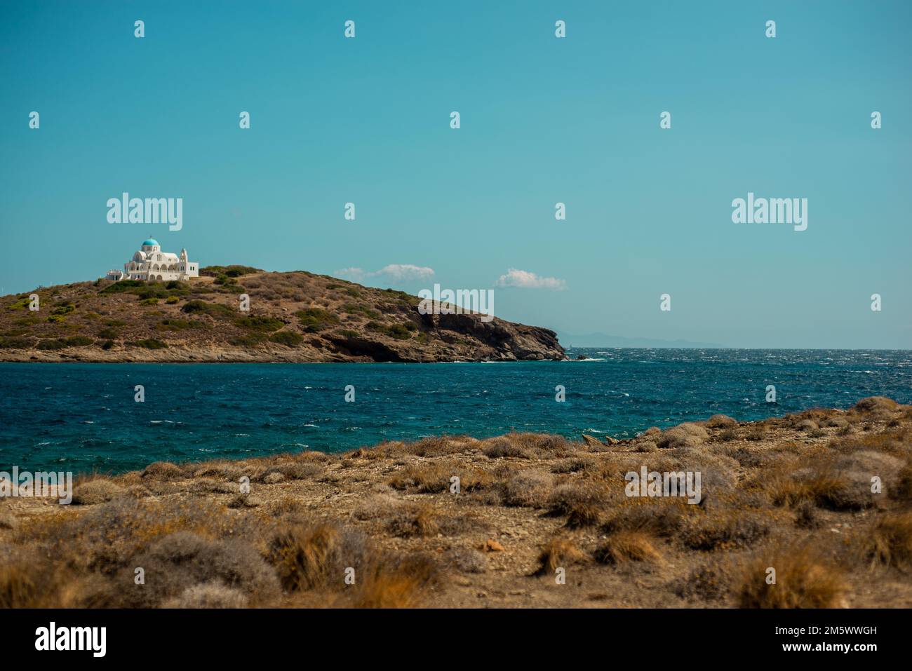 An image of a island with a white building on it surrounded with water ...