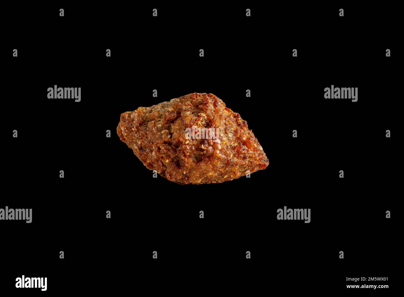 A close-up view of a Brazilian traditional kibe isolated on black a ...