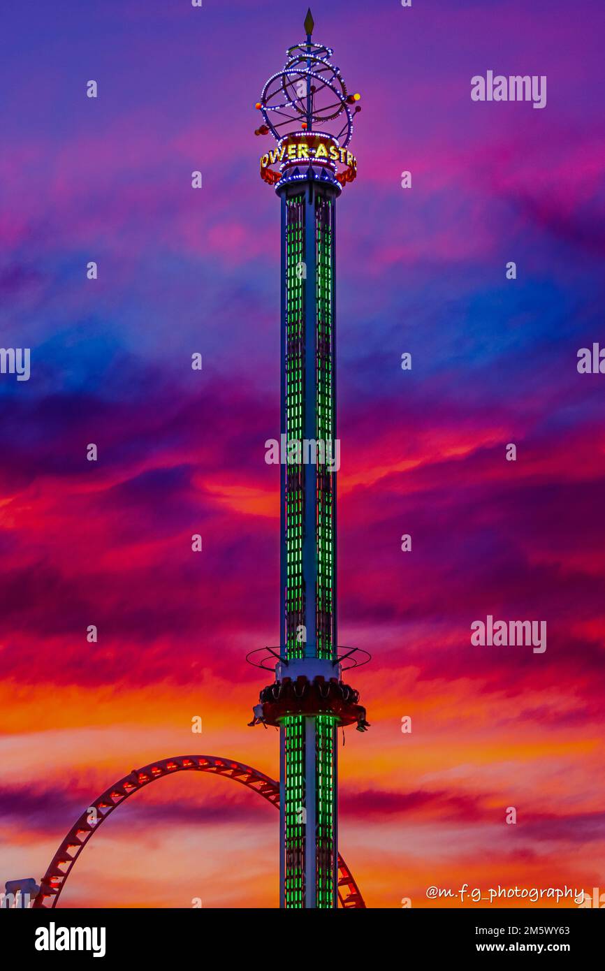 A low-angle shot of an Astro tower at Luna park in Coney Island, with a ...