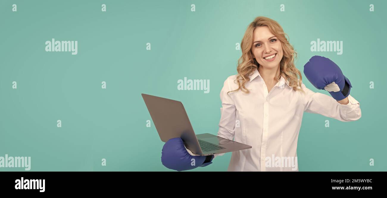 confident ceo woman in boxing gloves punching laptop, business fight ...