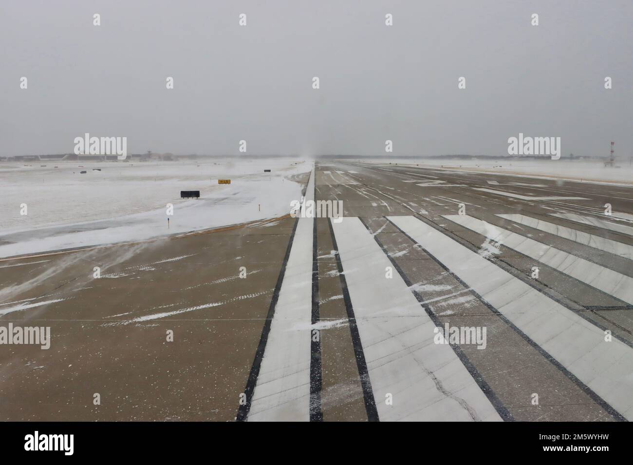 The runway in wind and snow at Cleveland Hopkins airport on Dec 24 2022 ...