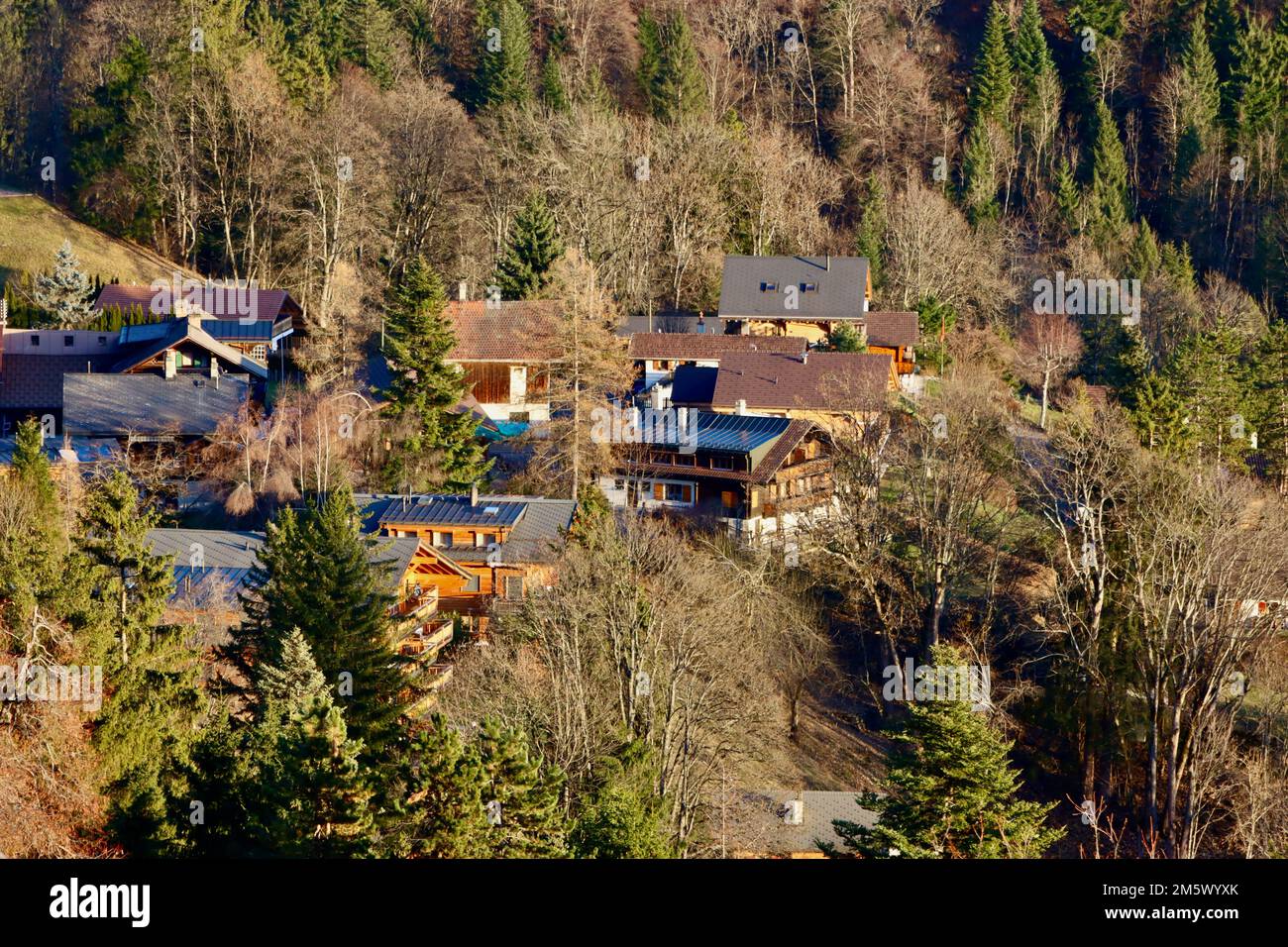 Chalets on the mountainside below Villars sur Ollon in Switzerland late ...