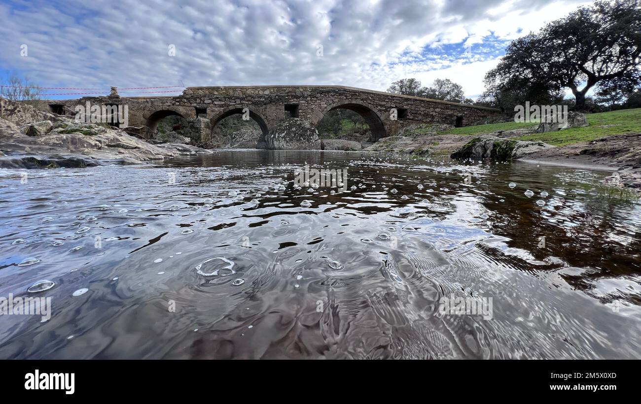 The Mocha Bridge over the Tamuja River Stock Photo - Alamy