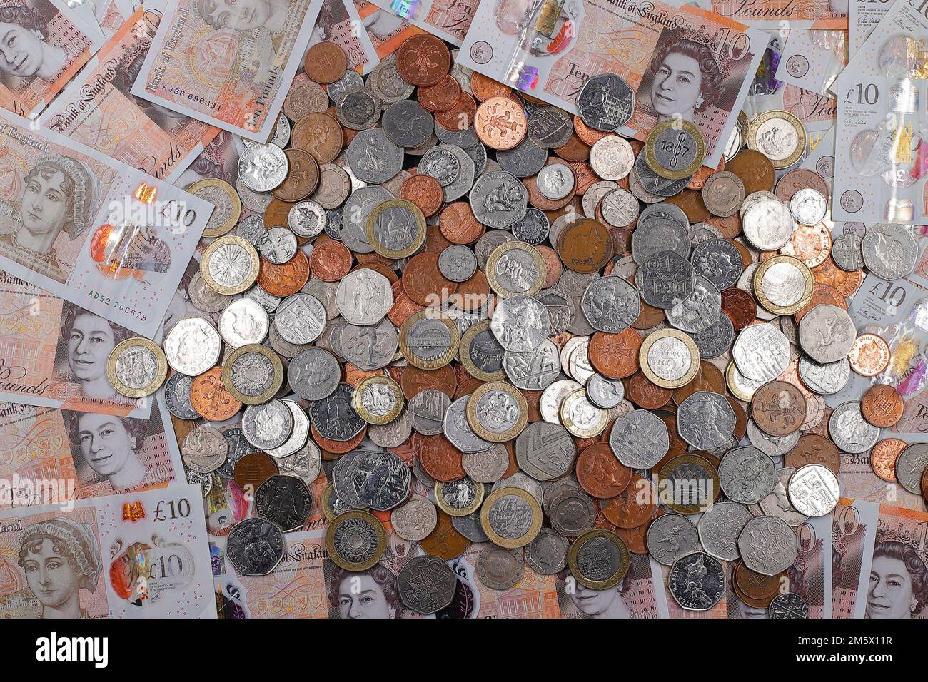 £10 bank notes & a pile of British coins including denominations of1p ...