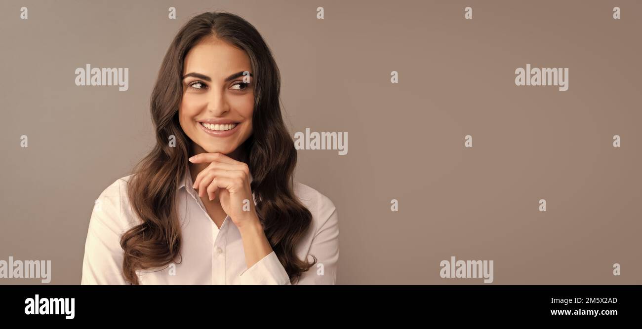 Thoughtful professional woman employee think smiling grey background ...