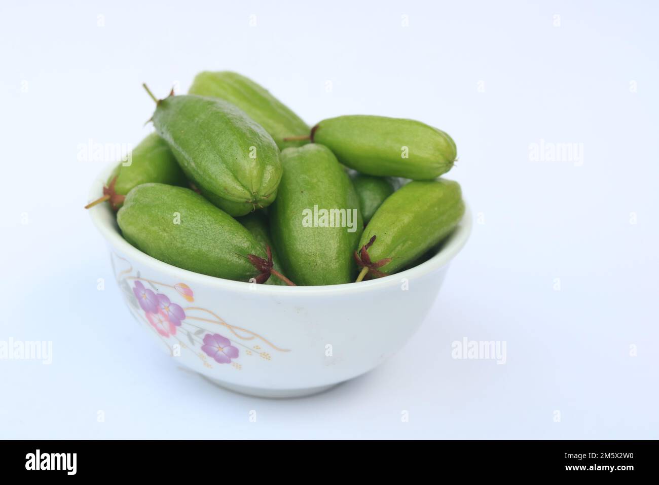 Fresh vegetable bilimbing fruit isolated on bowl,Close up bilimbi fruit ...