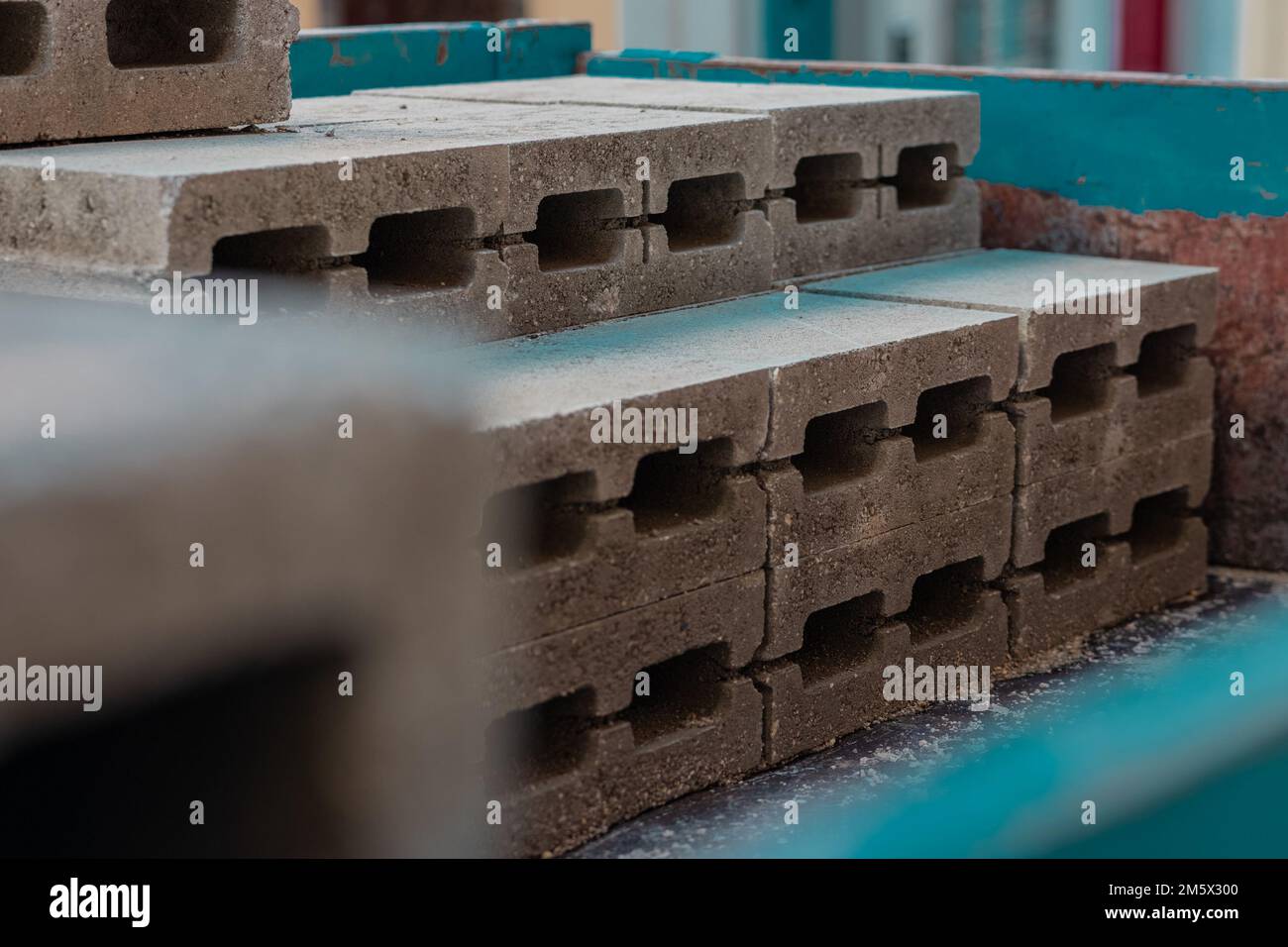 Concrete stone or building blocks loaded on a flatbed truck ready to be ...