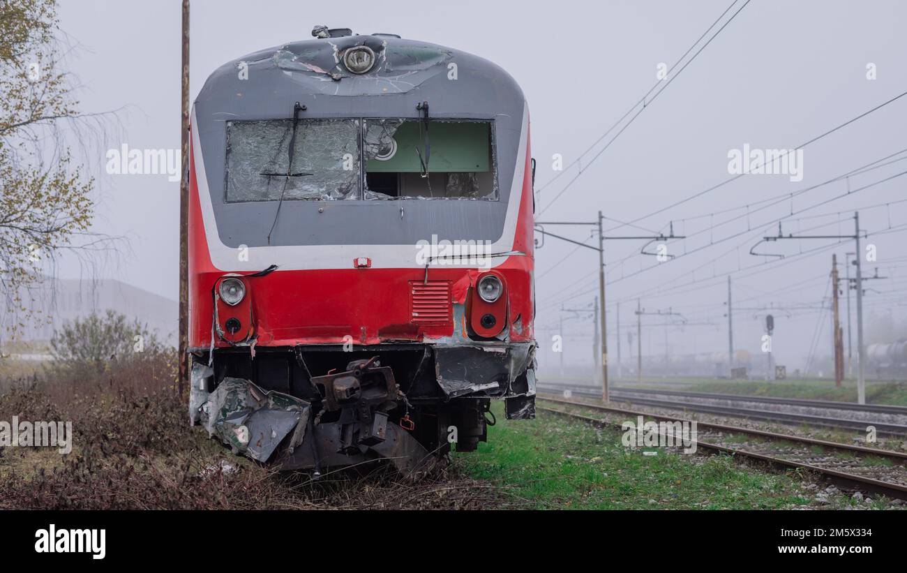 Destroyed and crashed diesel multiple unit train due to collision with ...