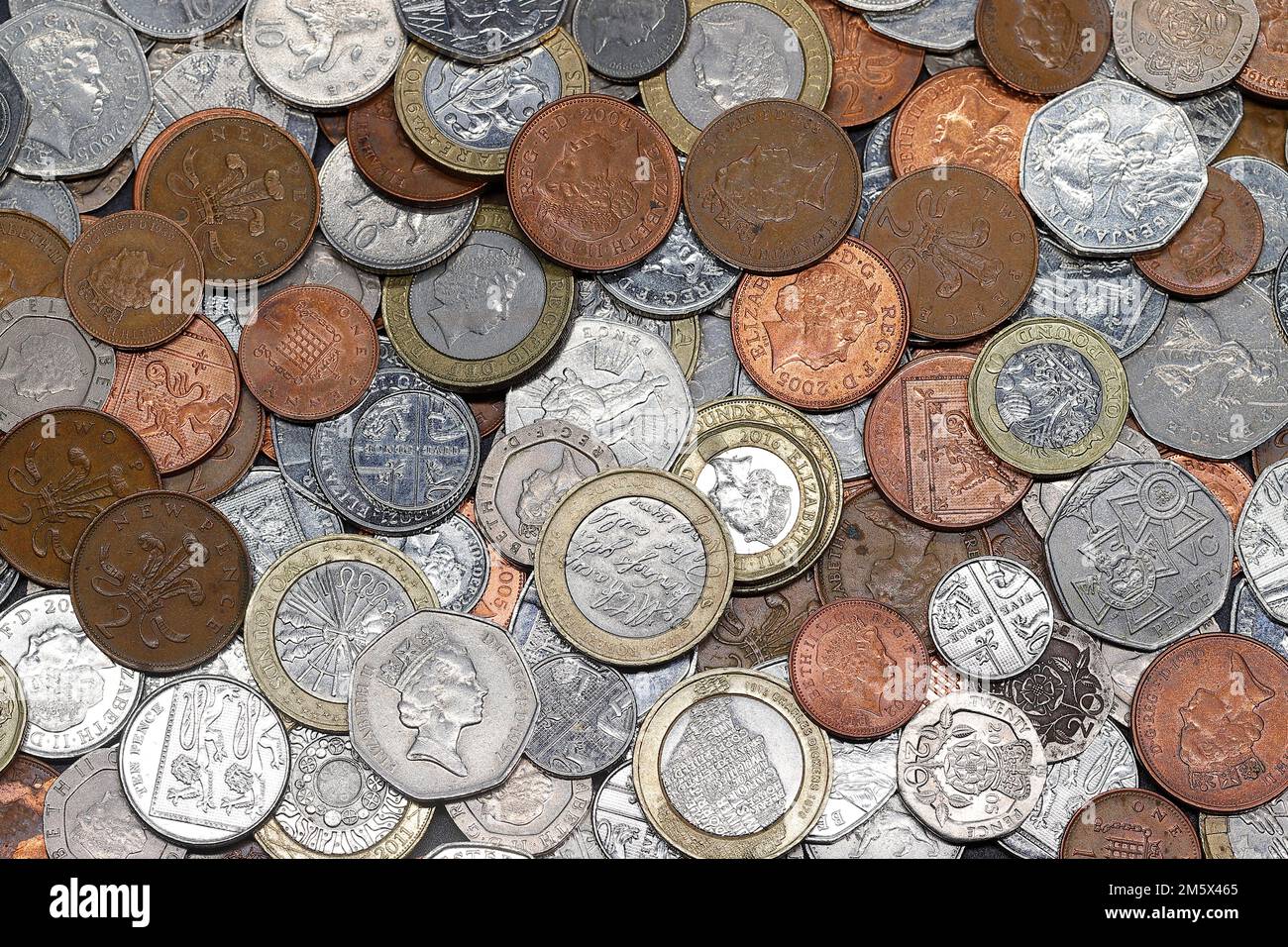 A mixture of sterling coins featuring the late Queen Elizabeth II ...