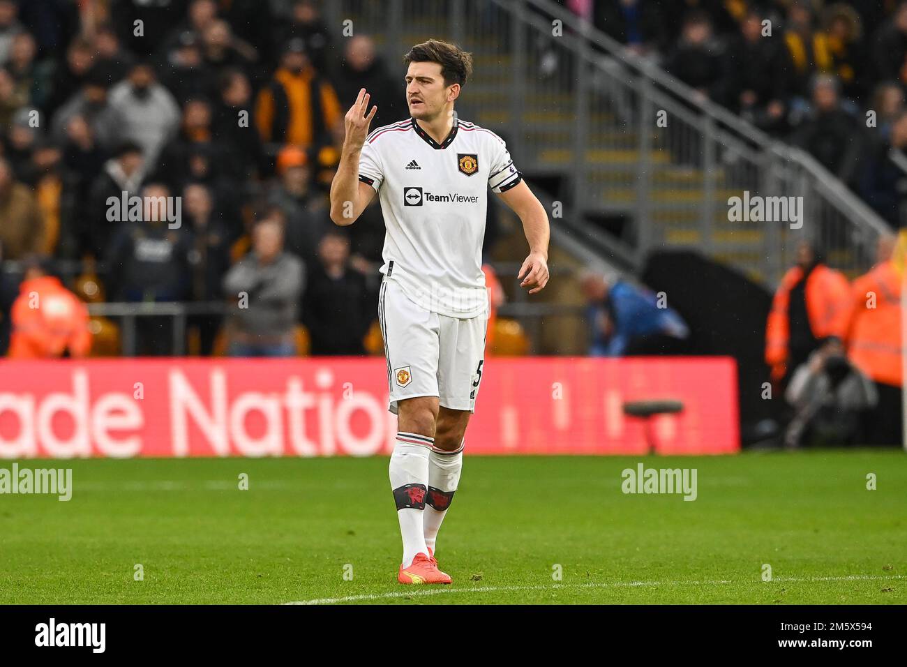Harry Maguire #5 of Manchester United gives his team instructions ...